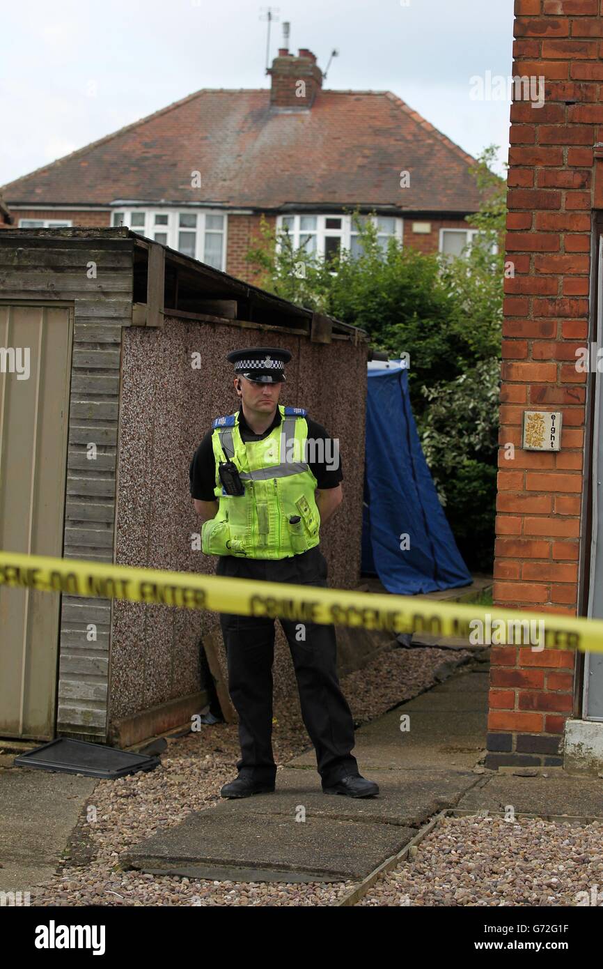 A Blue police tent erected in the garden of a house in York, which is ...