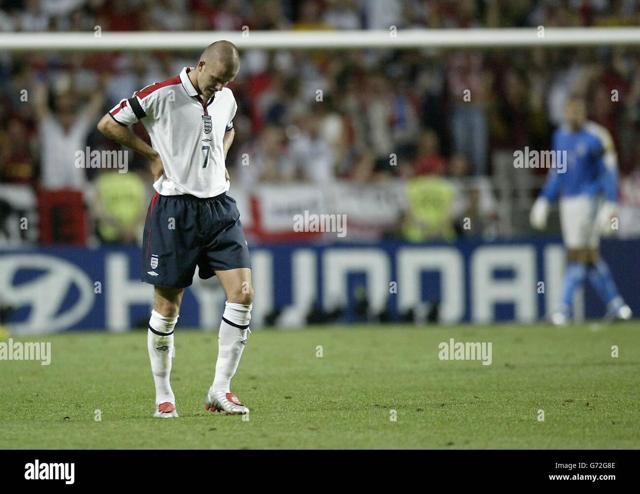 England's David Beckham shows his dejection after Portugal's equalising ...