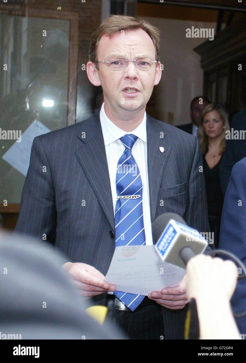Colin Englis reads a statement Stock Photo - Alamy
