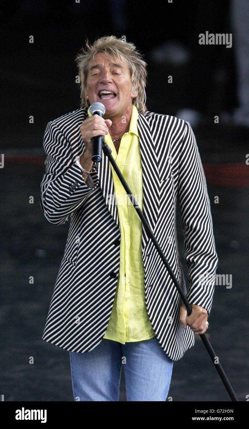 Singer Rod Stewart performs live on stage at the Olympic Torch Concert ...