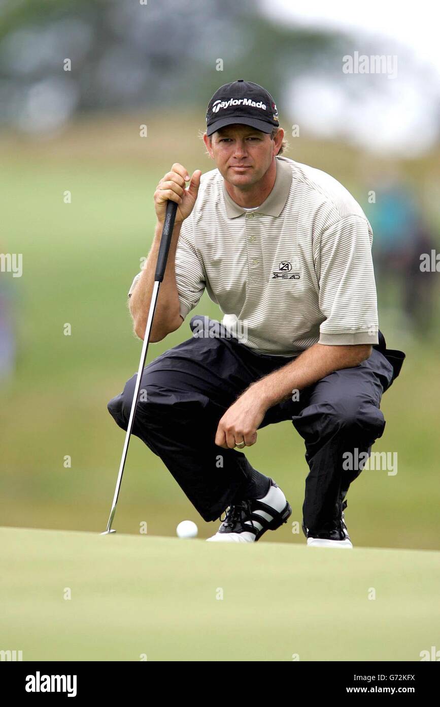 South African Retief Goosen lines up a putt on the 9th green on the ...