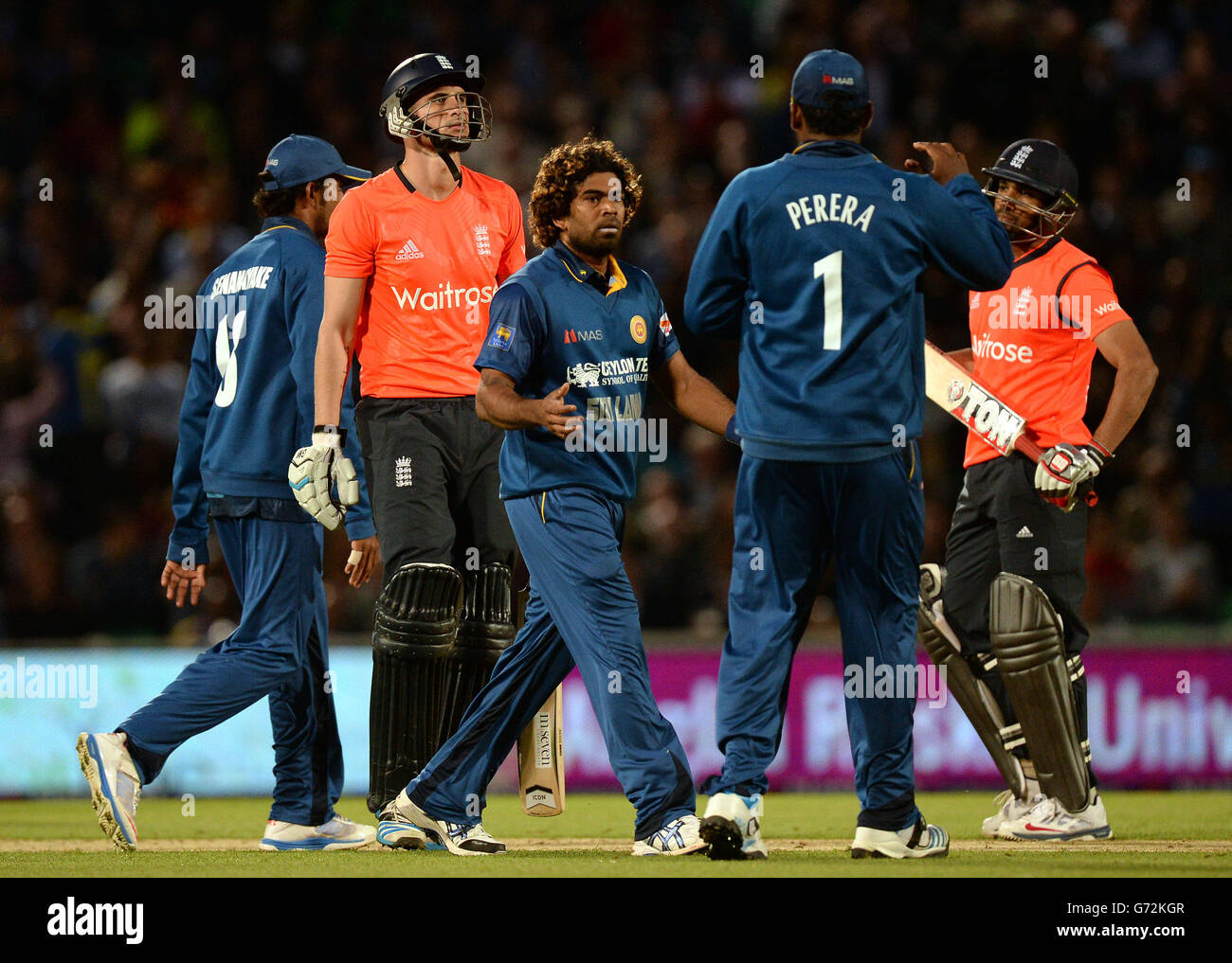 Sri Lanka's Lasith Malinga (centre) celebrates bowling out England's ...