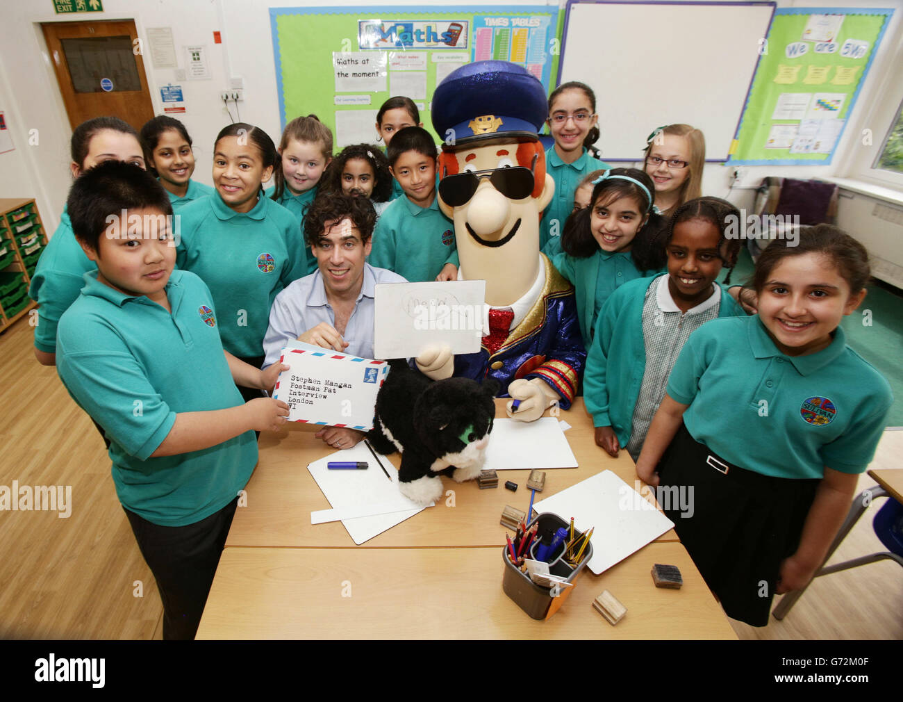 Postman Pat and Stephen Mangan School visit - London Stock Photo - Alamy