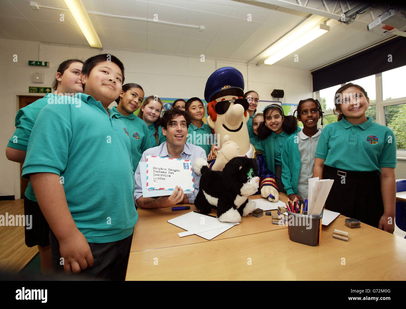 Postman Pat and Stephen Mangan School visit - London Stock Photo - Alamy