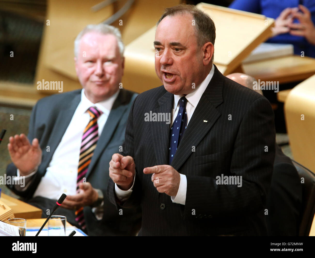 Scottish Health Secretary Alex Neil (left) listens to Scottish First ...