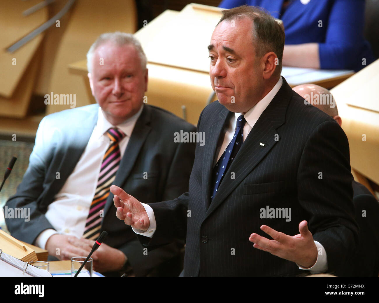 Scottish Health Secretary Alex Neil (left) listens to Scottish First ...