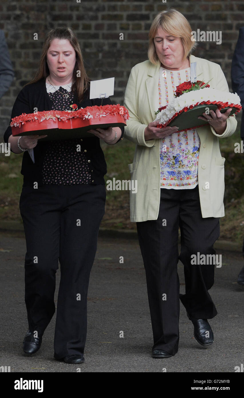 The widow of murdered soldier Lee Rigby, Rebecca Rigby (left) lays a ...