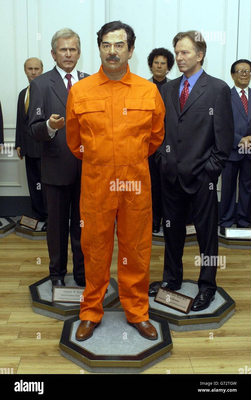 The waxwork of former Iraqi President Saddam Hussein wearing an orange ...