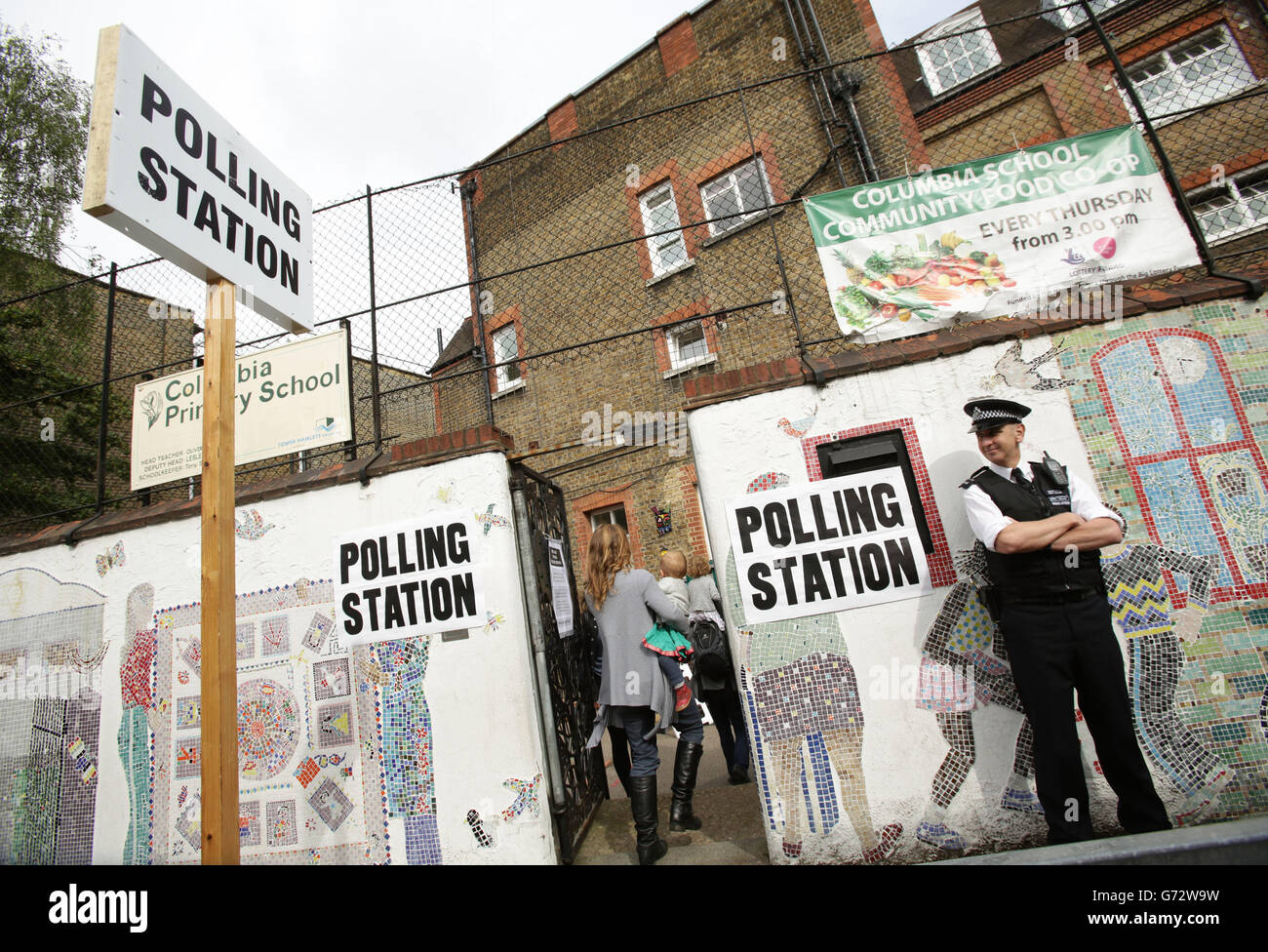 A police officer outside a polling station on Columbia Road in Tower ...