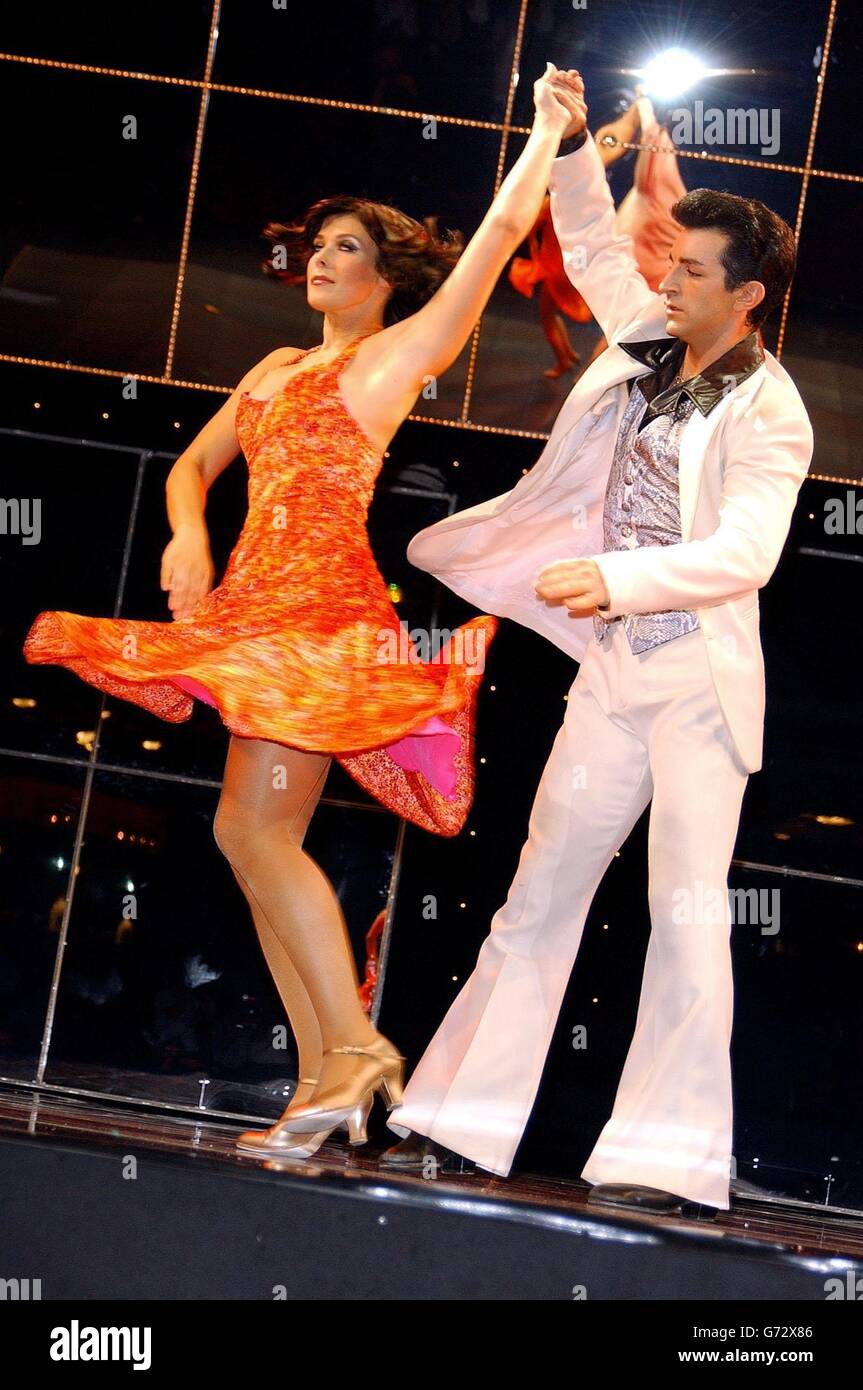 Singer Kym Ryder and Stephane Anelli perform on stage during rehearsals ...