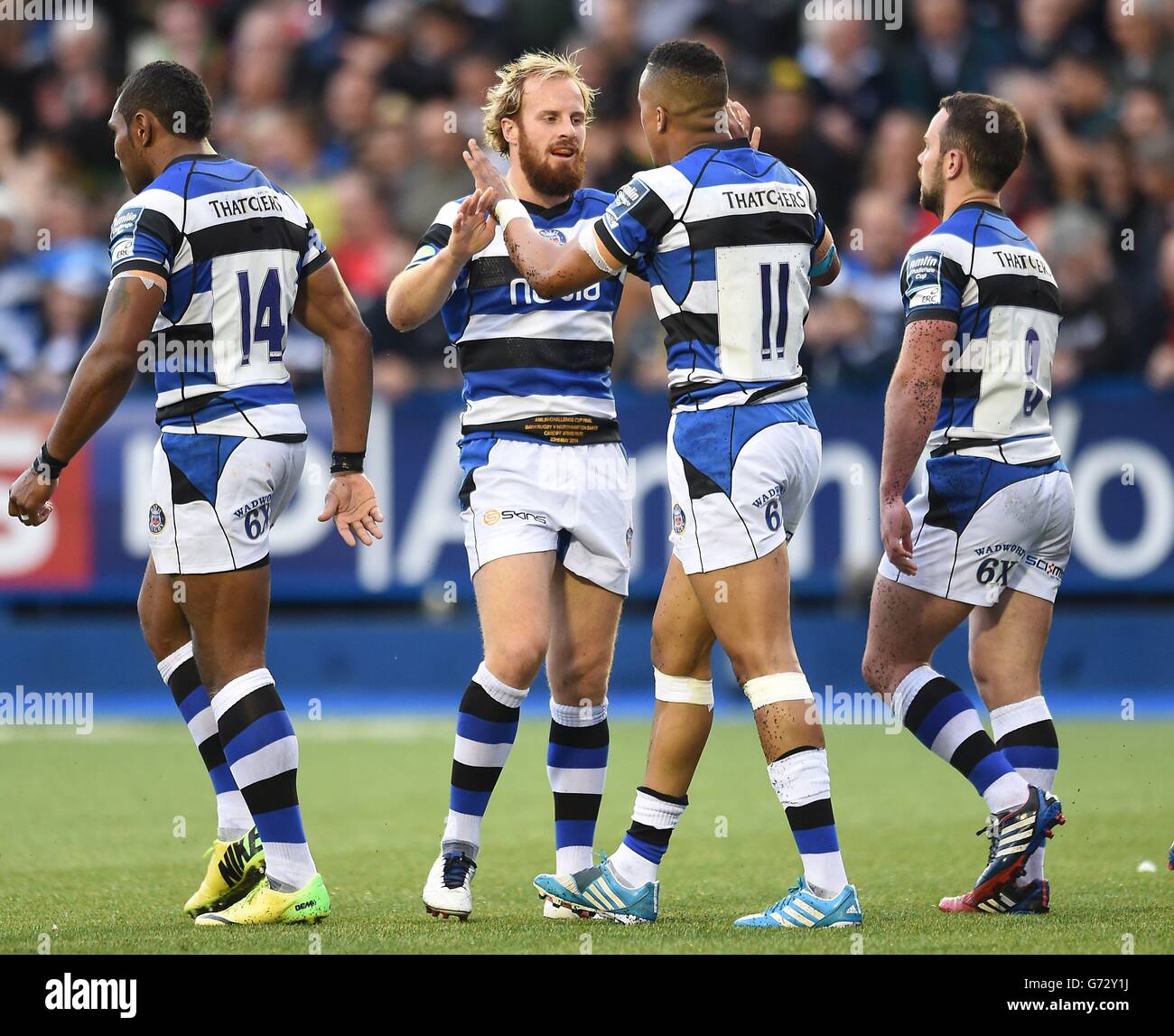 Bath Rugby's Anthony Watson (second from right) celebrates his try with ...