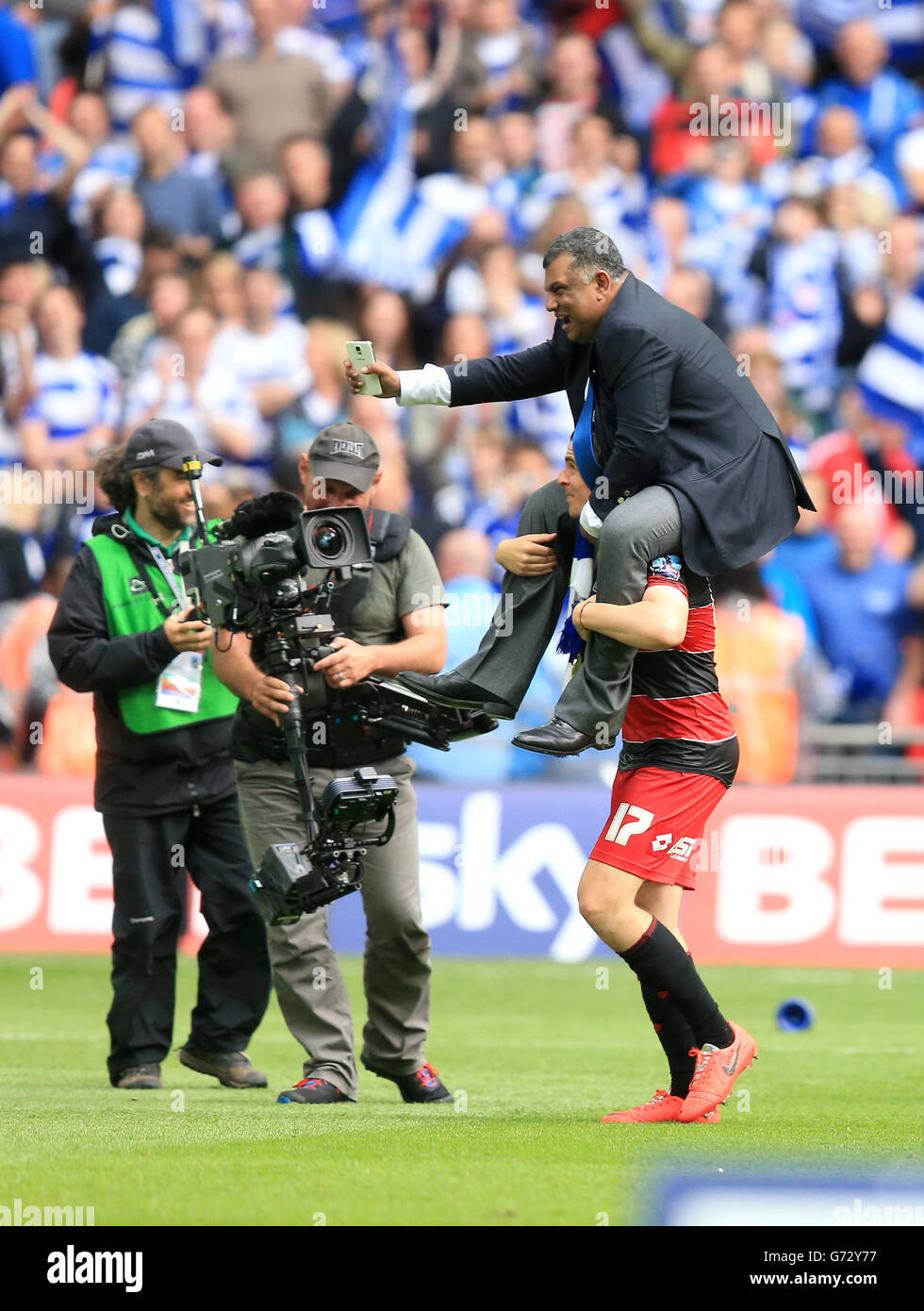 Queens Park Rangers' Joey Barton lifts up club chairman Tony Fernandes ...