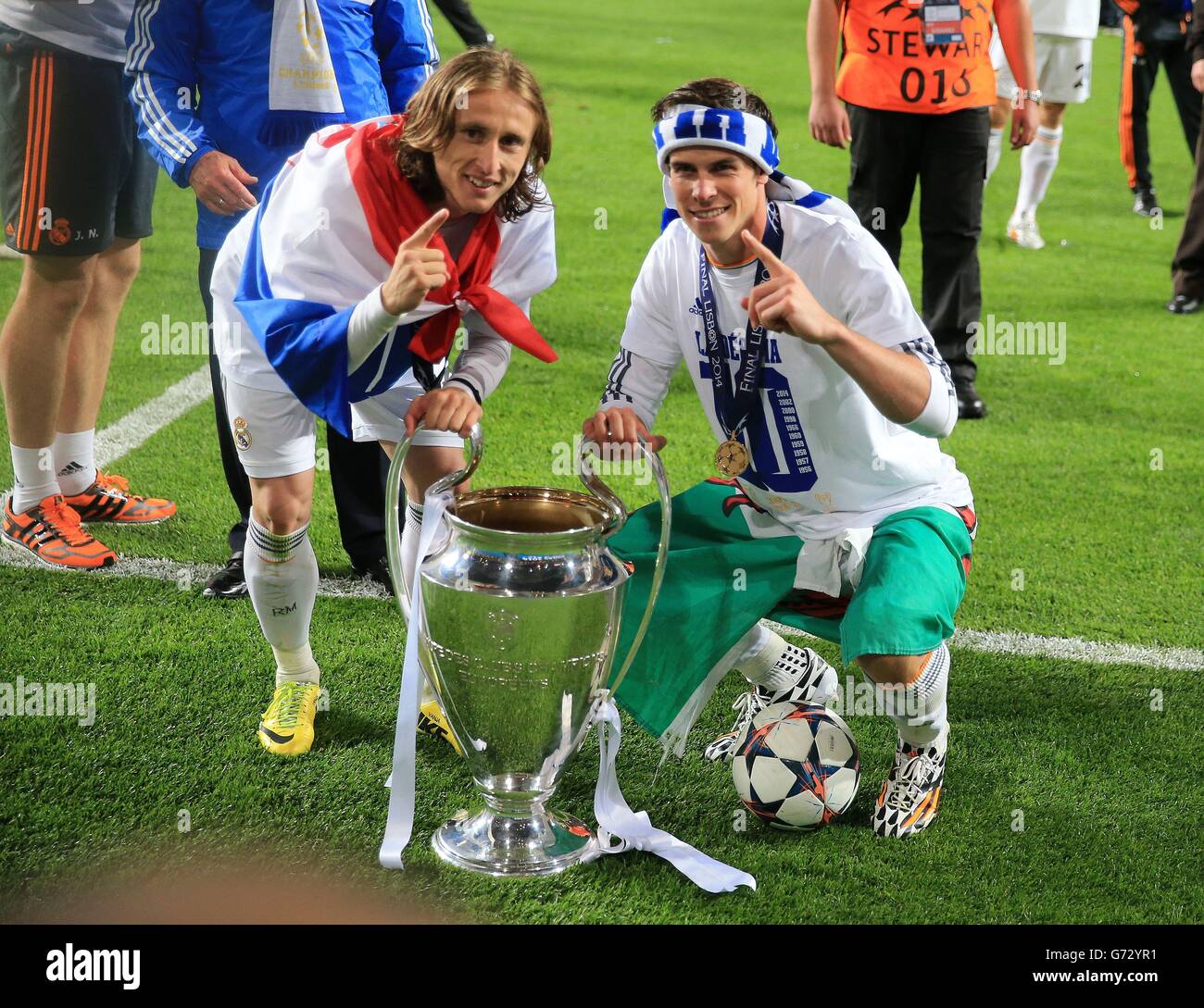 Real Madrid's Luka Modric (left) and Gareth Bale celebrate after ...