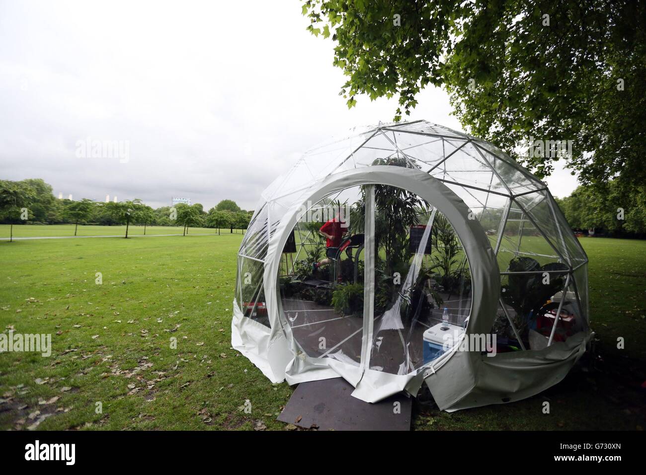 Alex Dickie runs on a running machine inside in a specially crated ...