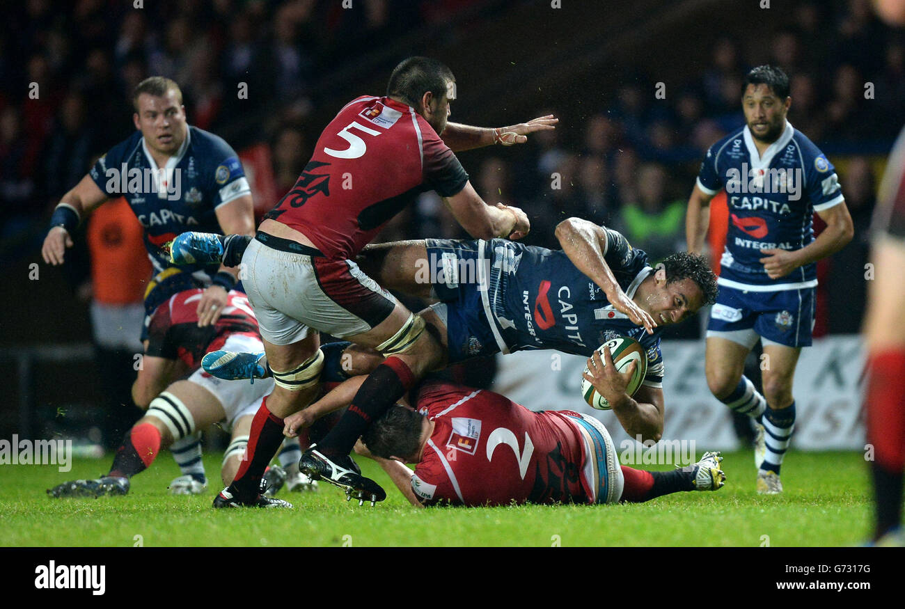 Bristol Rugby's Marco Mama is tackled by London Welsh's Matt Corker and ...