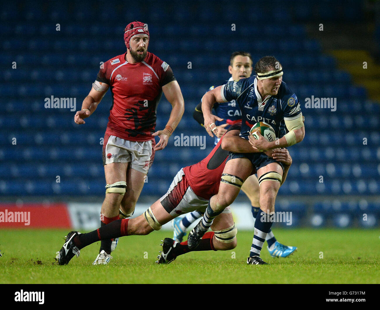 Bristol Rugby's Nick Koster (right) breaks away from a tackle by London ...