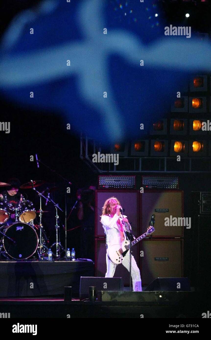 The Darkness lead singer Justin Hawkins on the main stage during T in ...