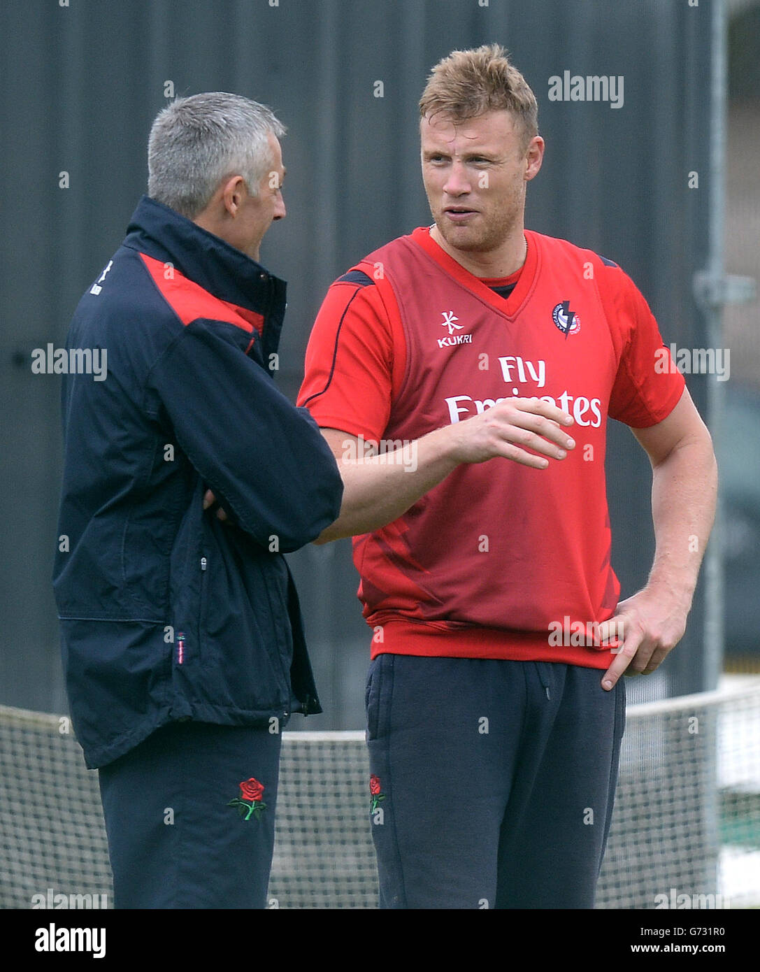 Andrew Flintoff (right) talks with Lancashire director of cricket Mike ...