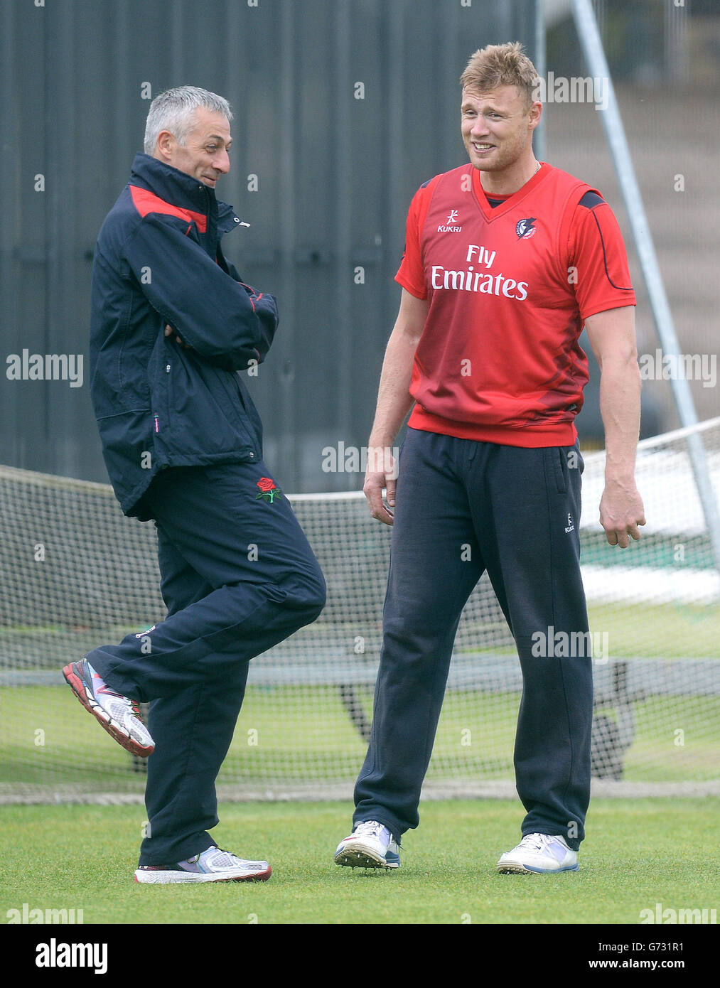 Andrew Flintoff (right) talks with Lancashire director of cricket Mike ...