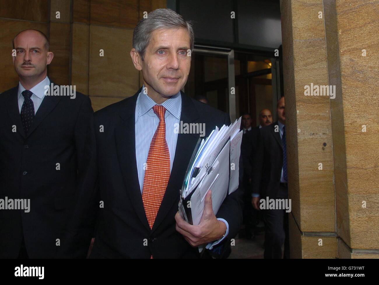 The chief executive Stuart Rose leaves Cabot Hall at Canary Wharf in ...