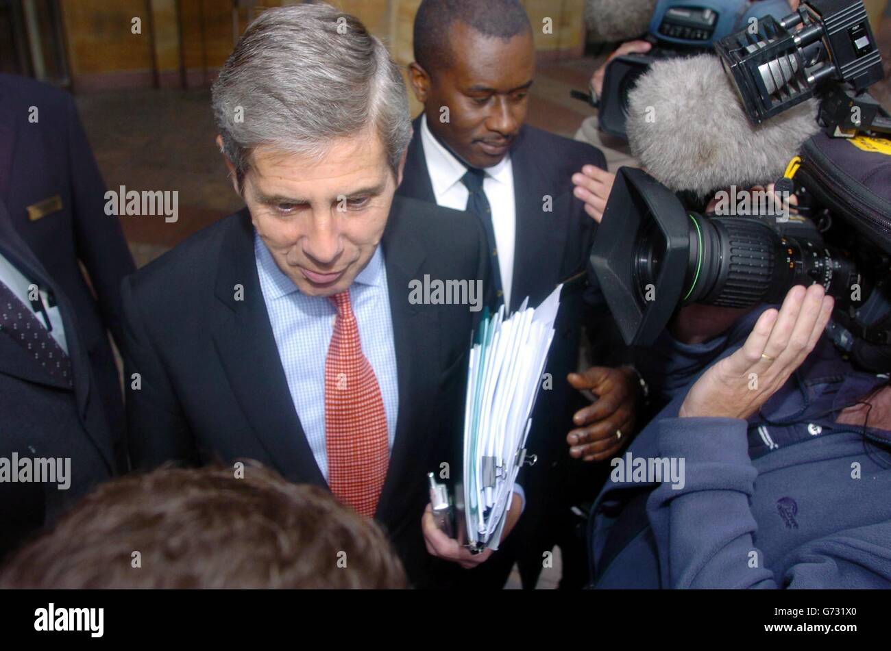 The chief executive Stuart Rose leaves Cabot Hall at Canary Wharf in ...