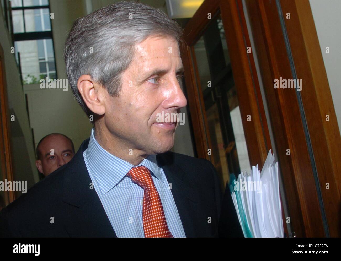 The chief executive Stuart Rose leaves Cabot Hall at Canary Wharf in ...