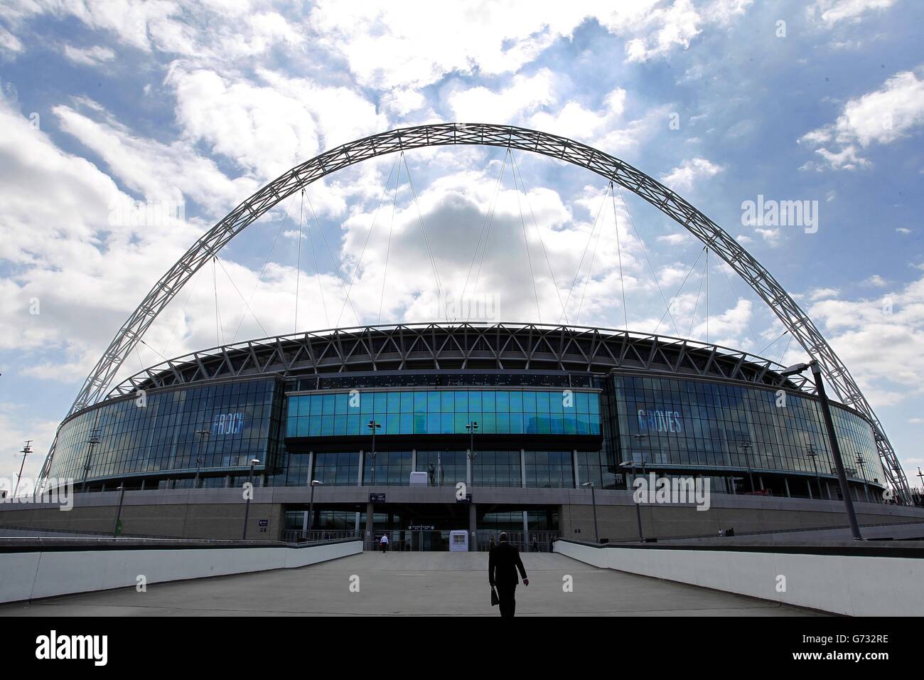 Wembley Way outside Wembley Stadium with people coming and going ahead ...