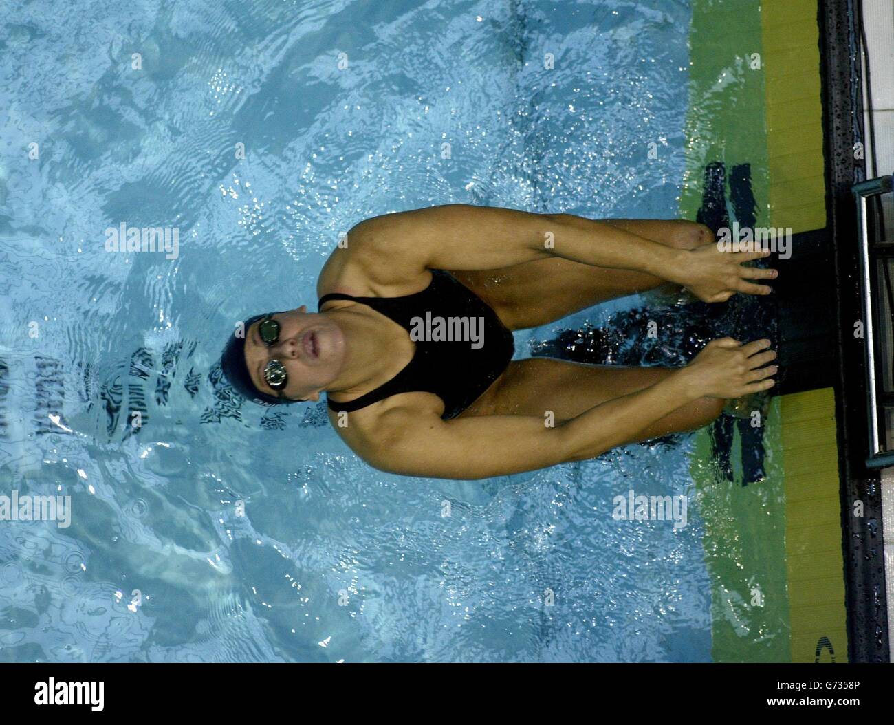 Loughborough University's Sarah Price flies backwards at the start of ...