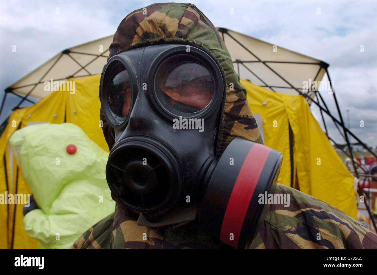 A policeman wears a gas mask during 'Exercise Horizon' at the National ...