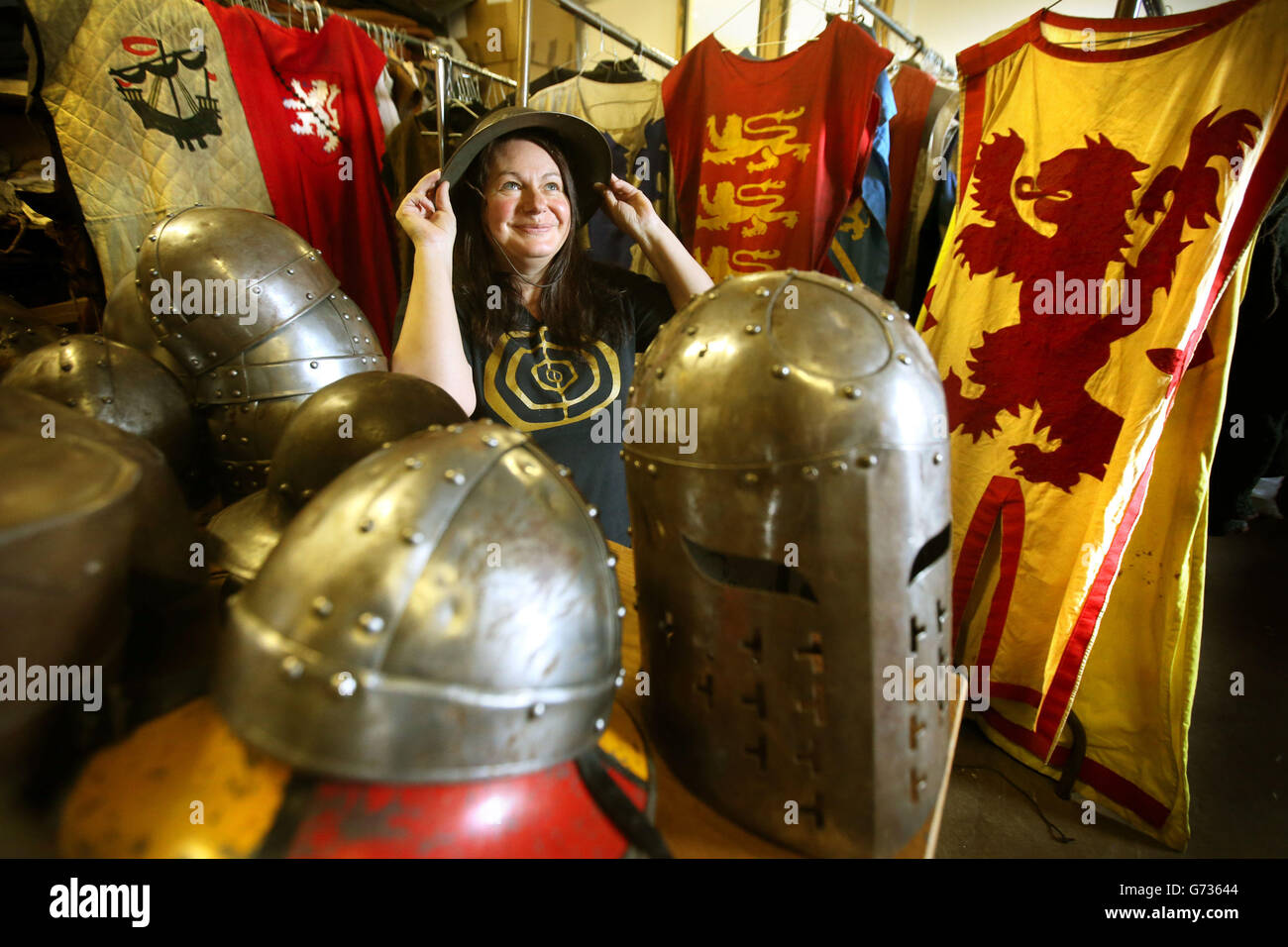 Annette Grier from the Clanranald Trust tries on a helmet as she lines ...