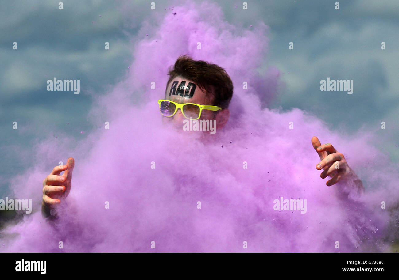 Participants take part in the Color Me Rad 5km run at Ingleston in ...