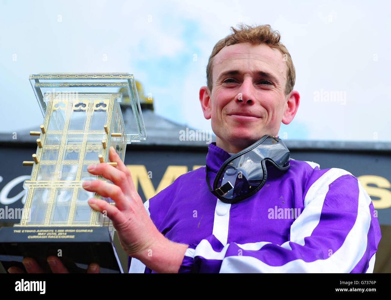 Ryan Moore with his trophy after Marvellous won The Etihad Airways ...