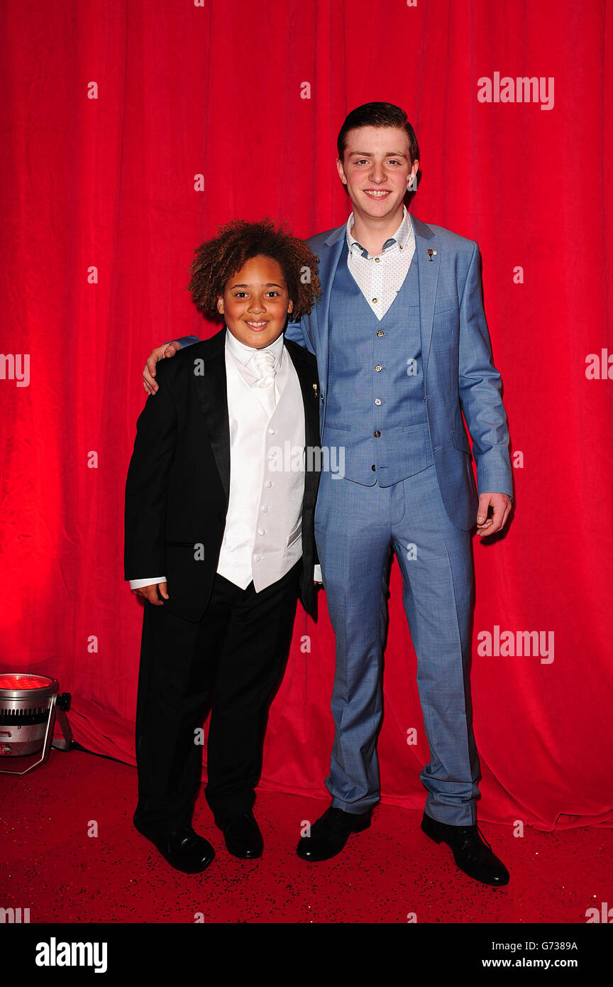 Devon Higgs and James Forde (right) arriving for the 2014 British Soap ...