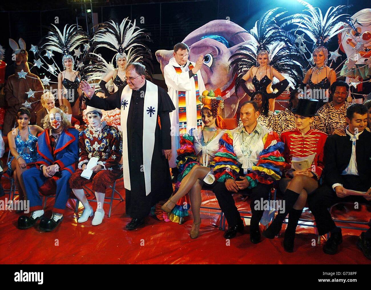 Father Gerard Dasey, the Dean of Scarborough (left) assisted by Father ...