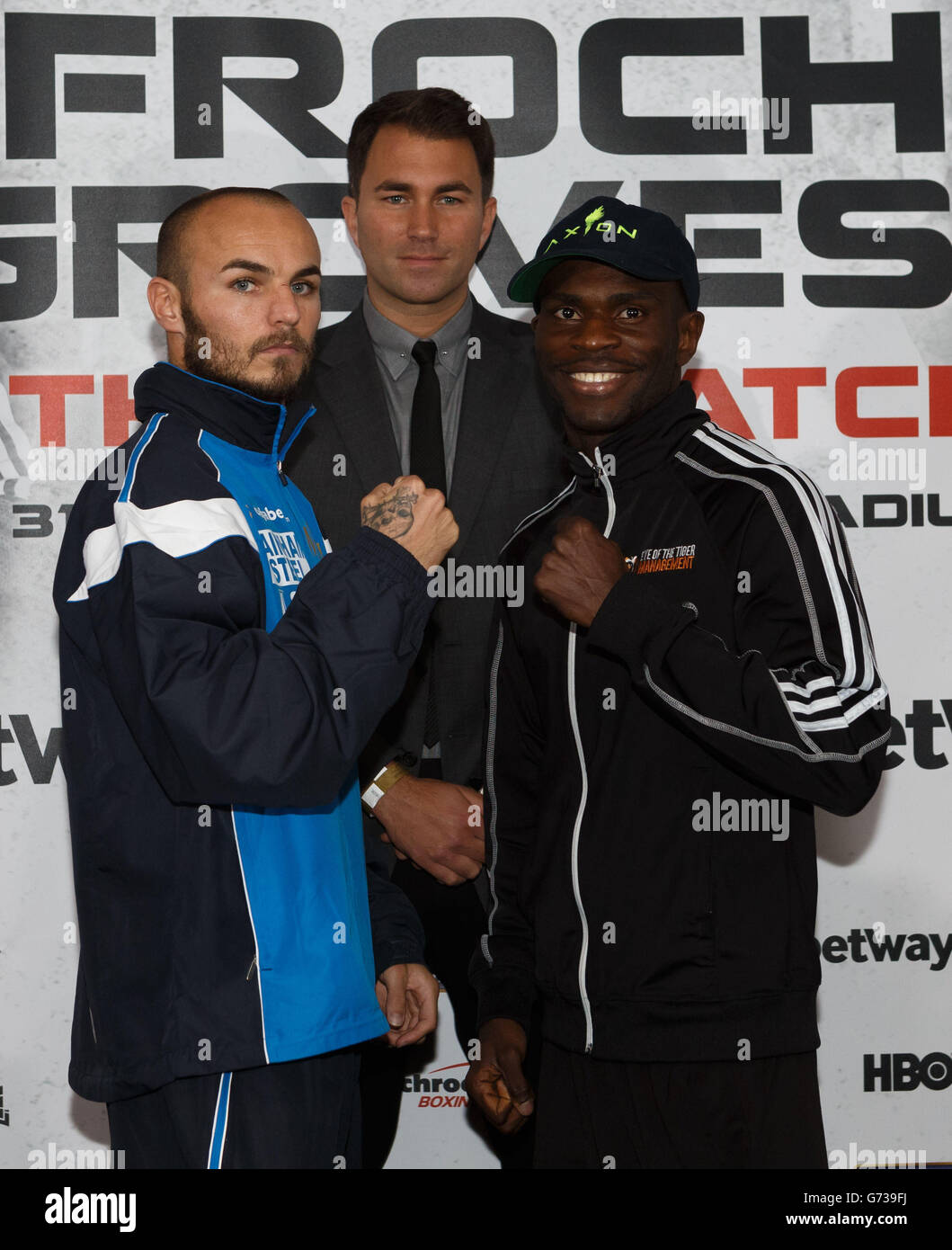 Kevin Mitchell, (left) with his opponent Ghislain Maduma, (right ...
