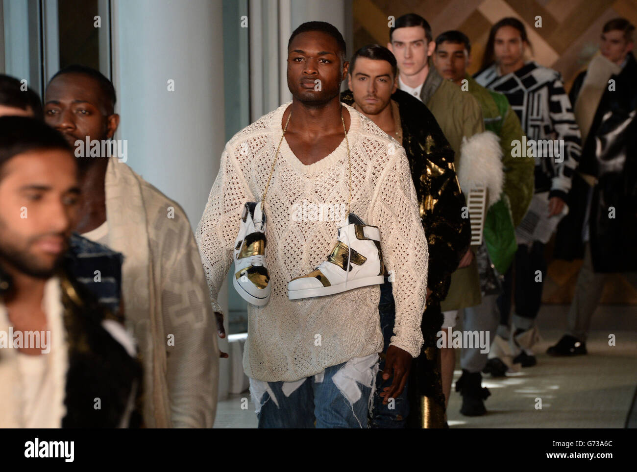 Models wear designs by Justin Alves-Khan during the Royal College of ...