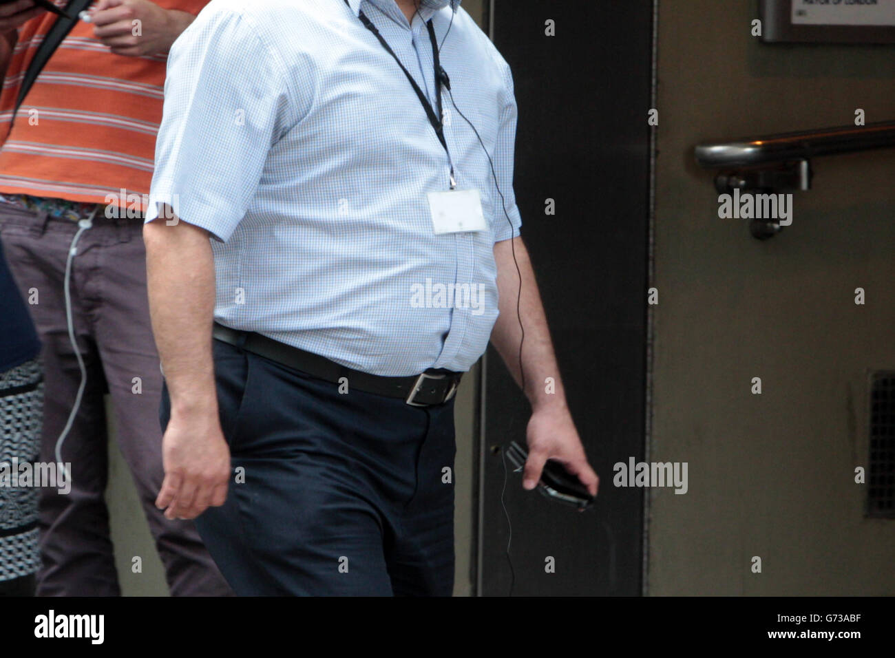 A general view of an overweight man outside London Bridge station ...