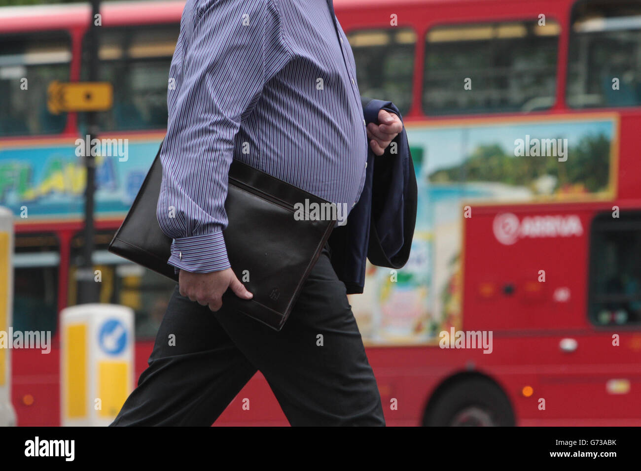 Overweight man outside london bridge station hi-res stock photography ...