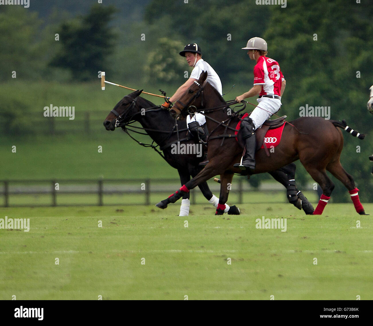 Prince Harry playing in a charity polo match at Coworth Park near Ascot ...