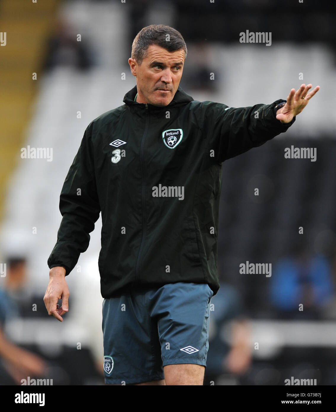 Republic of Ireland's coach Roy Keane takes the warm up before the ...