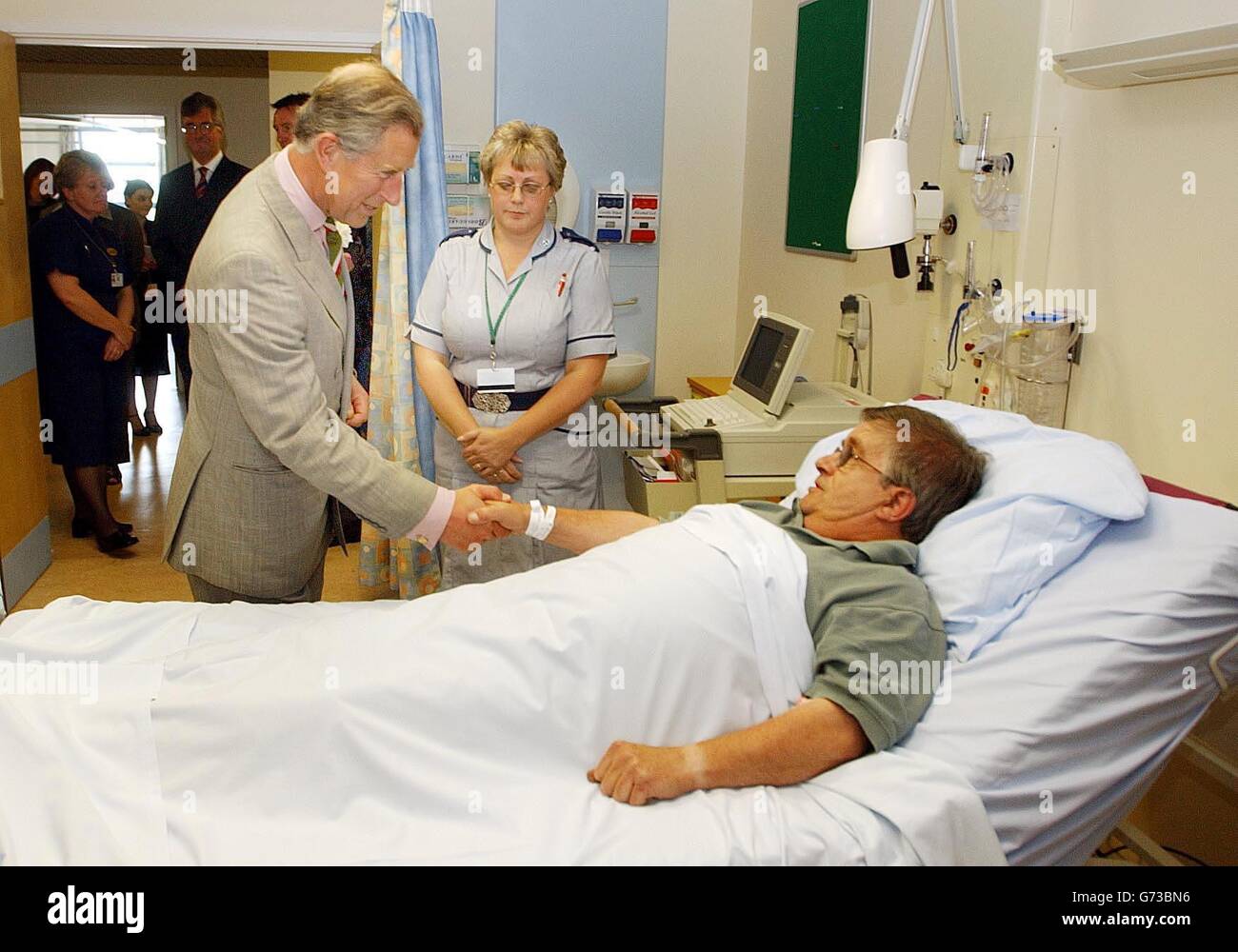 Prince Charles meets Peter Lloyd of Aberdare during a visit to the ...