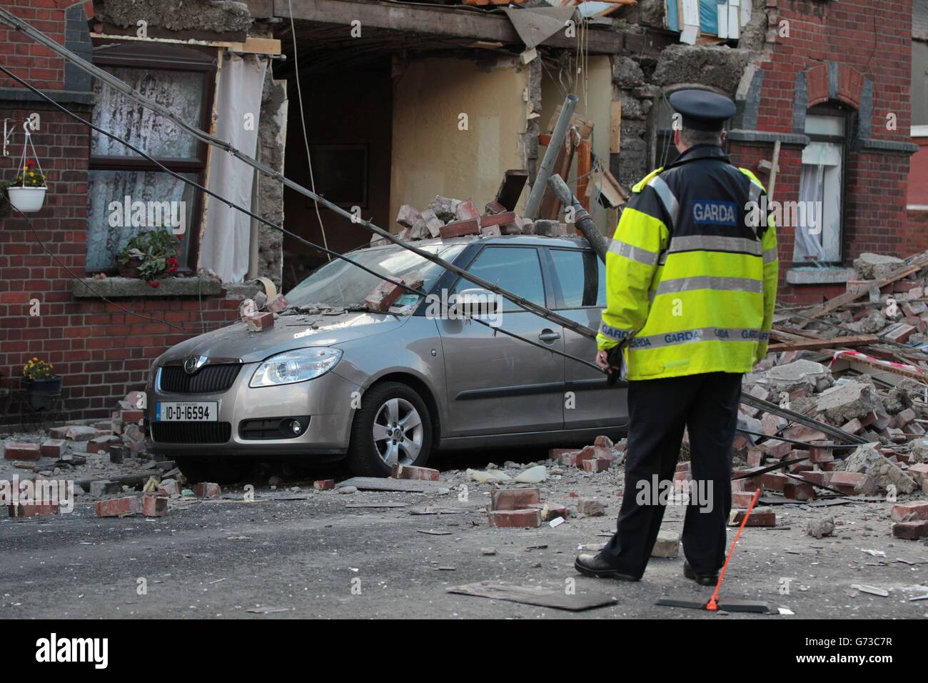 Emergency services at the scene in a suspected gas explosion on ...