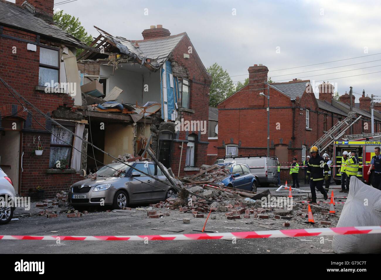 Emergency services at the scene in a suspected gas explosion on ...