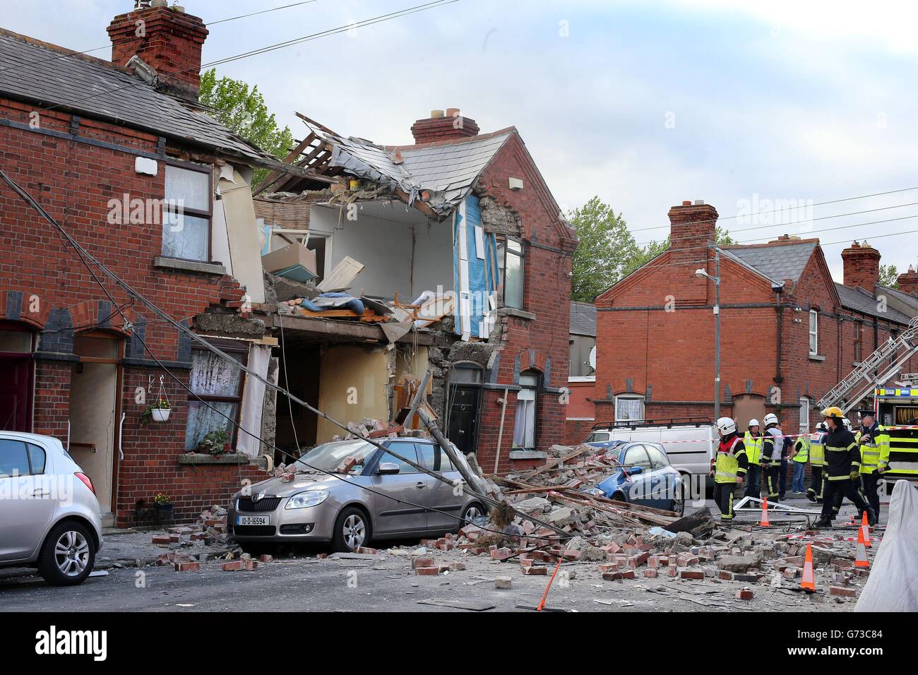 Emergency services at the scene in a suspected gas explosion on ...