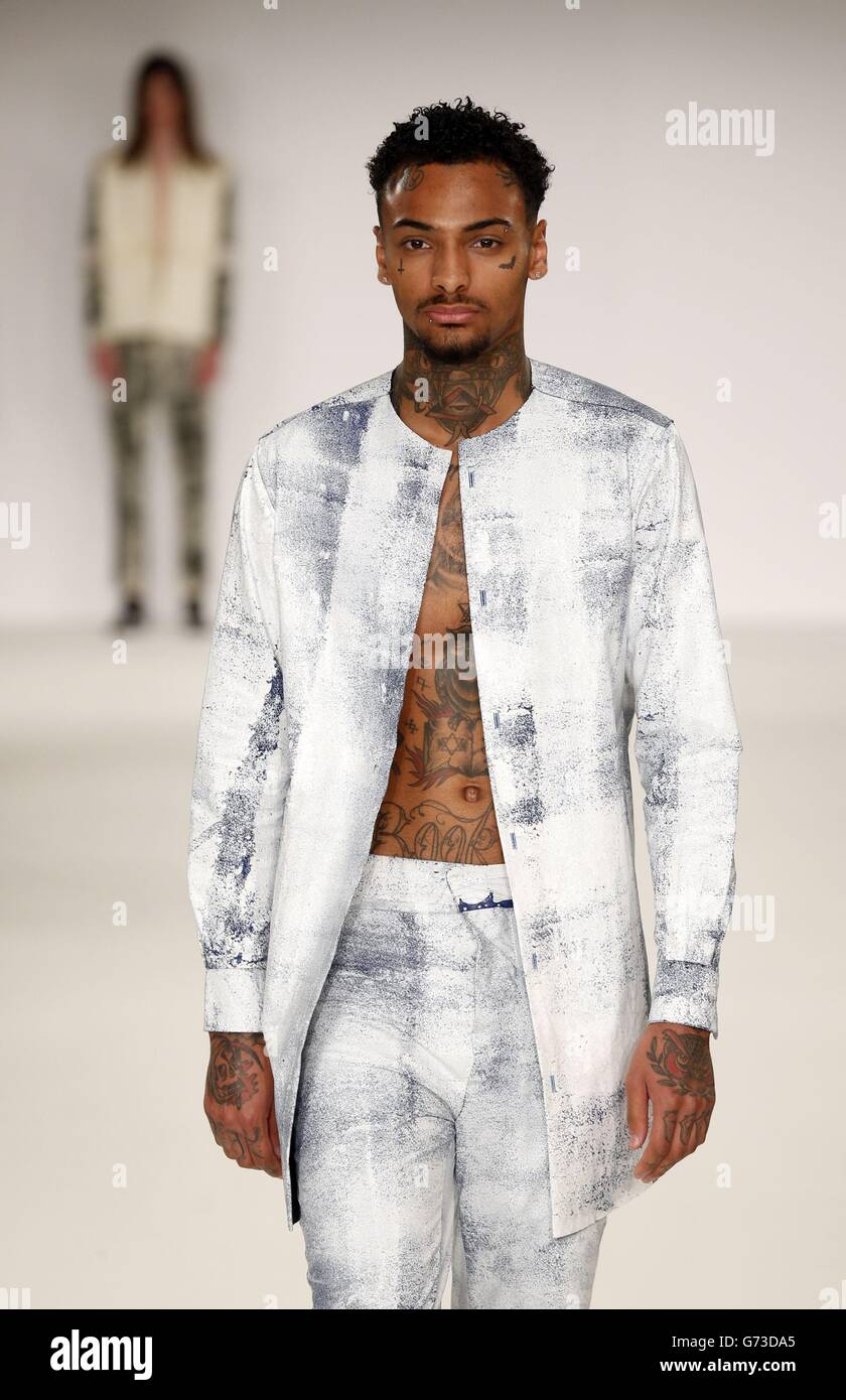 Models appear on the catwalk during the Graduate Fashion Week ...