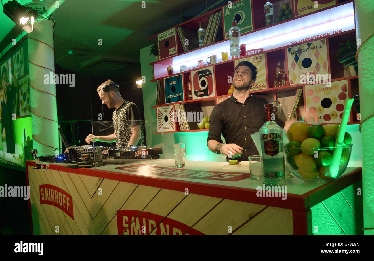 EDITORIAL USE ONLY Mr Hudson (left) and the Smirnoff barman unveil 10 ...