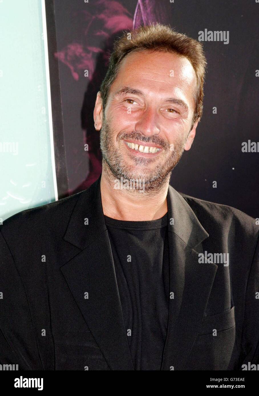 Director Pitof arrives for the premiere of his latest film Catwoman ...