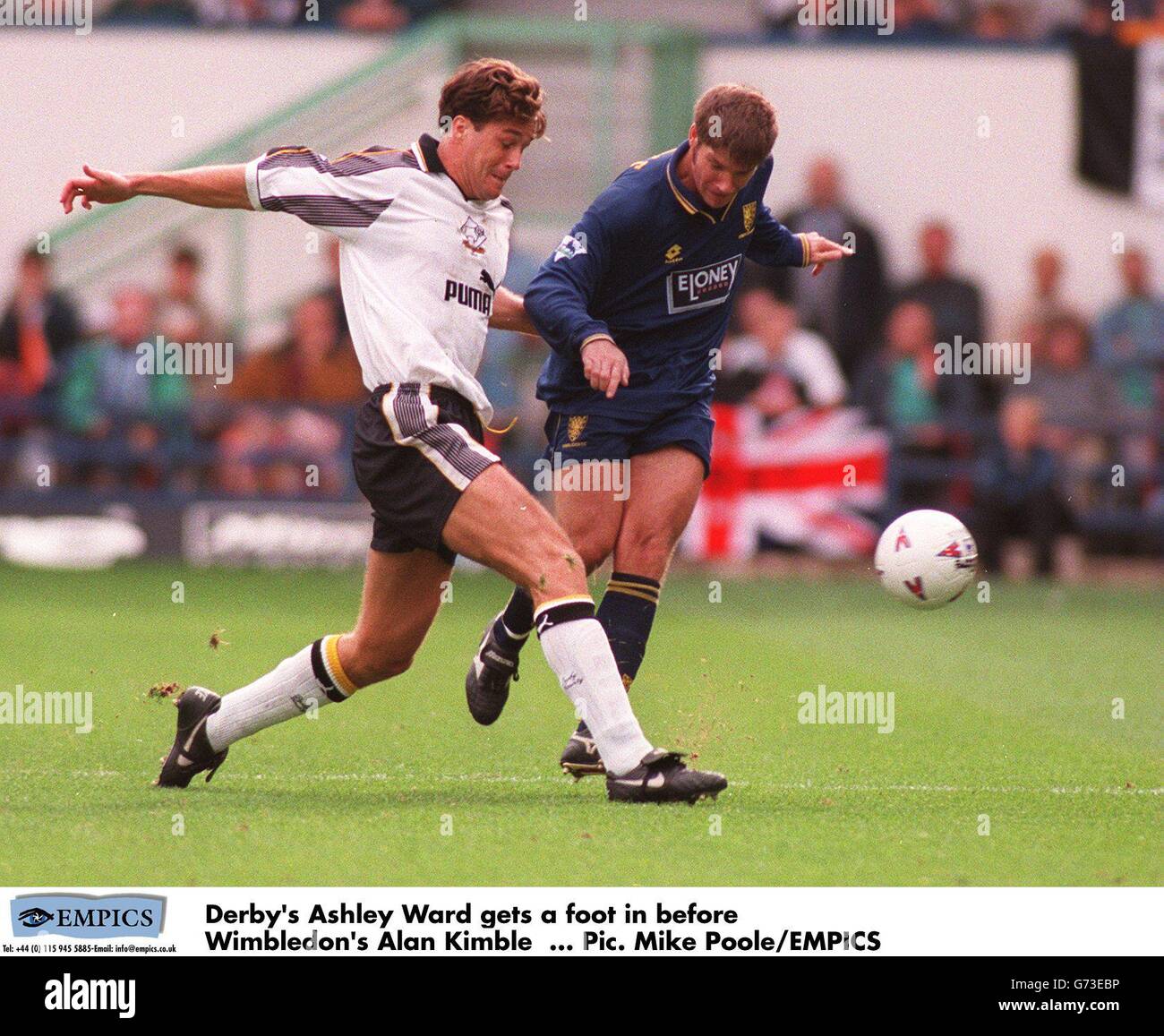 Derby's Ashley Ward gets a foot in before Wimbledon's Alan Kimble Stock ...