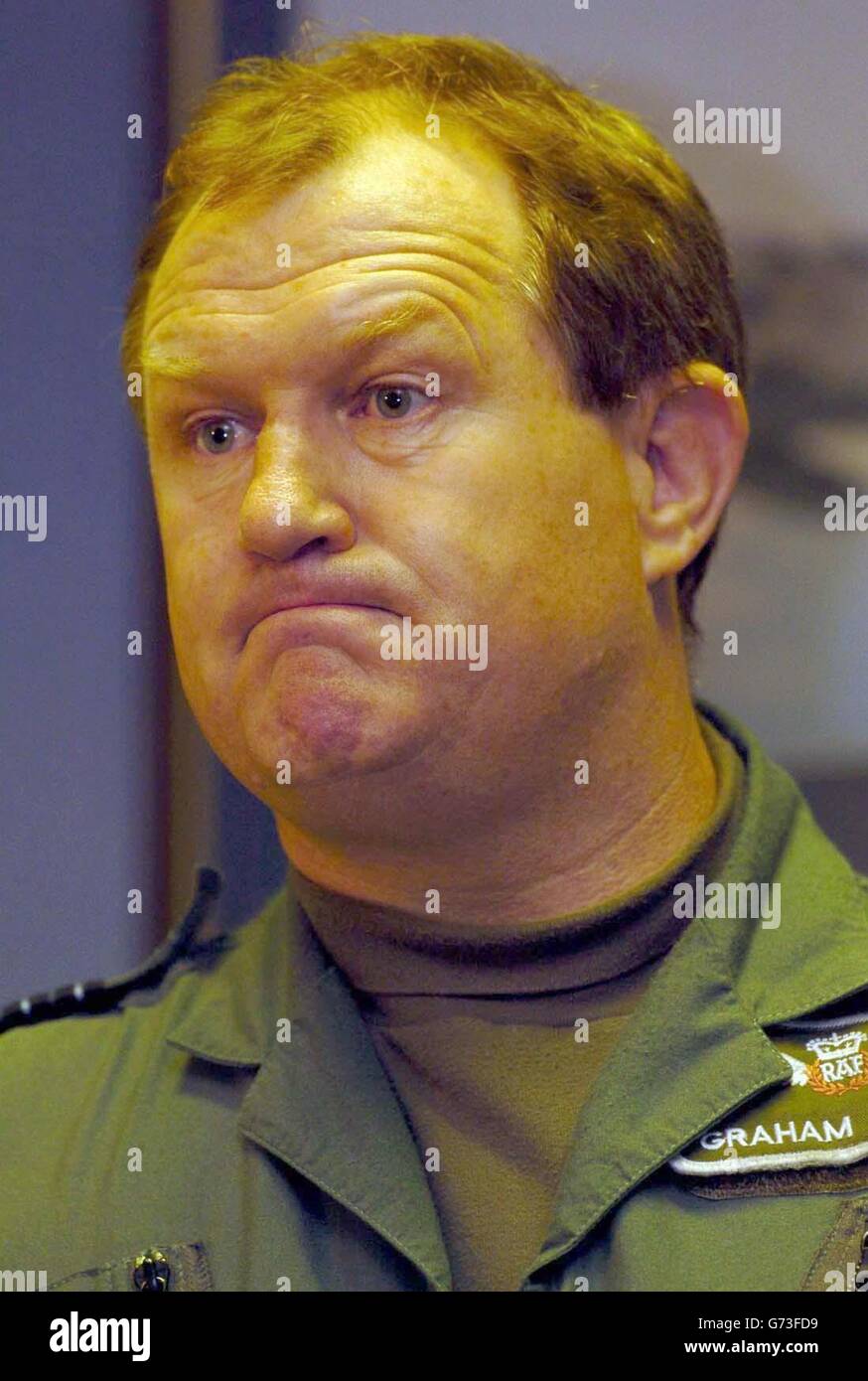 Tight Lipped Station Commander Graham Wright speaks at a press ...