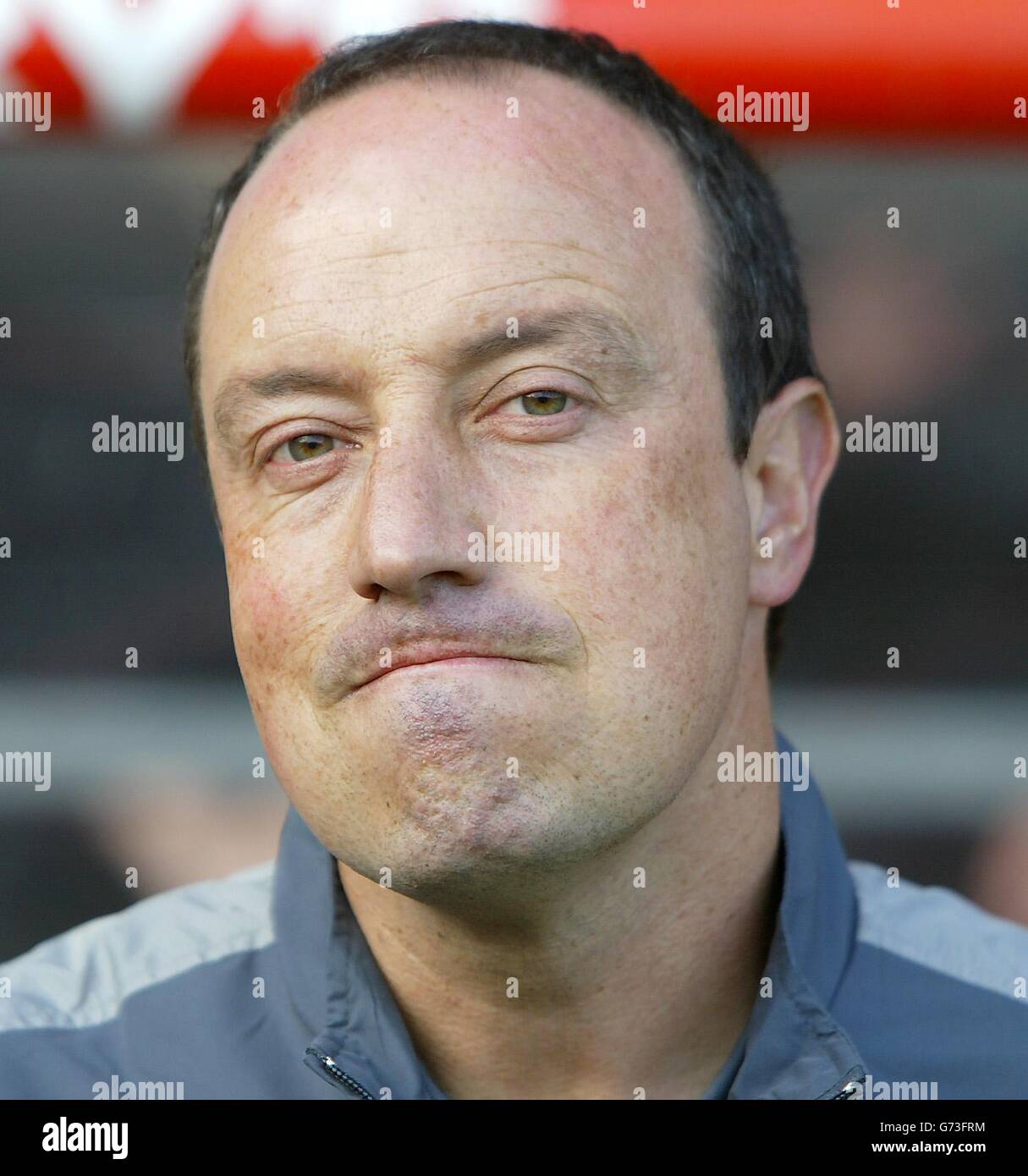 New Liverpool manager Rafael Benitez watches his team in action during ...